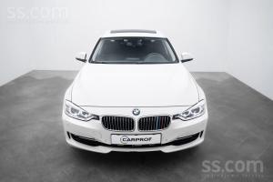 White BMW 318 2013 in Tallinn, with an engine capacity of 2.00 L and mileage of 169 thousand km for 12999 €, photo 5 on AUTOMOTO.COM.LV