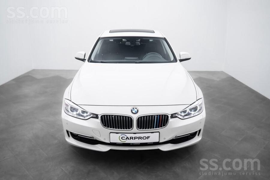 White BMW 318 2013 in Tallinn, with an engine capacity of 2.00 L and mileage of 169 thousand km for 12999 €, photo 5 on AUTOMOTO.COM.LV