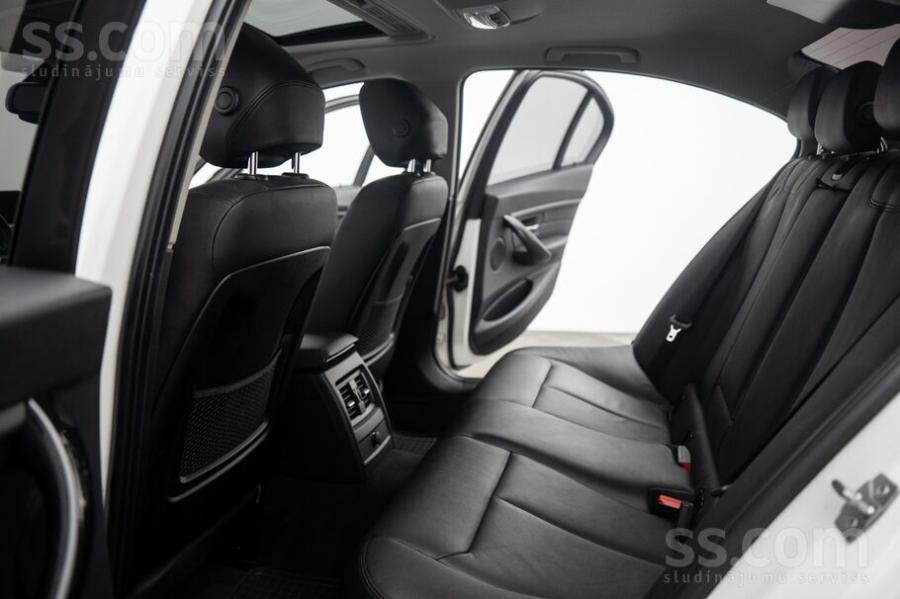 White BMW 318 2013 in Tallinn, with an engine capacity of 2.00 L and mileage of 169 thousand km for 12999 €, photo 11 on AUTOMOTO.COM.LV