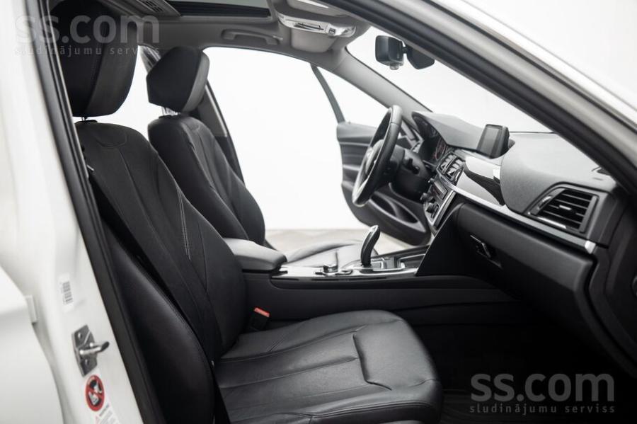 White BMW 318 2013 in Tallinn, with an engine capacity of 2.00 L and mileage of 169 thousand km for 12999 €, photo 13 on AUTOMOTO.COM.LV