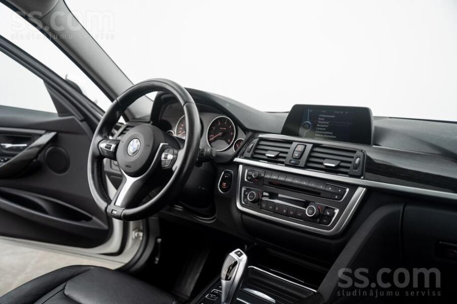 White BMW 318 2013 in Tallinn, with an engine capacity of 2.00 L and mileage of 169 thousand km for 12999 €, photo 14 on AUTOMOTO.COM.LV
