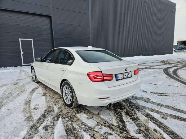 White BMW 318 2017 in Kaunas, with an engine capacity of 1.50 L and mileage of 128 thousand km for 6500 €, photo 6 on AUTOMOTO.COM.LV
