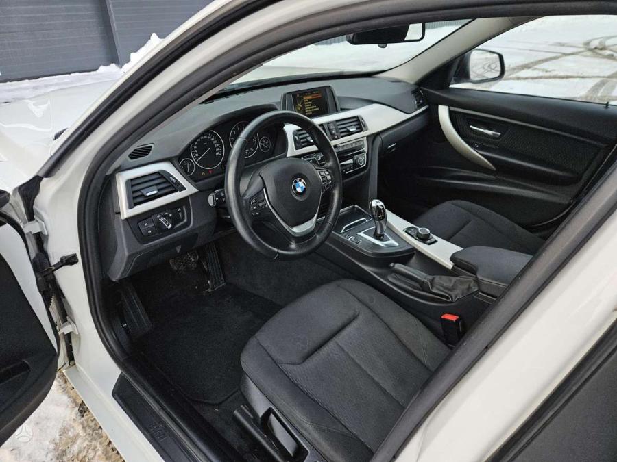 White BMW 318 2017 in Kaunas, with an engine capacity of 1.50 L and mileage of 128 thousand km for 6500 €, photo 15 on AUTOMOTO.COM.LV