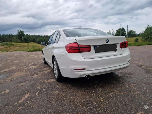 White BMW 318 2017 in Trakai, with an engine capacity of 1.50 L and mileage of 128 thousand km for 12500 €, photo 5 on AUTOMOTO.COM.LV