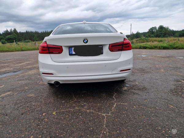 White BMW 318 2017 in Trakai, with an engine capacity of 1.50 L and mileage of 128 thousand km for 12500 €, photo 6 on AUTOMOTO.COM.LV