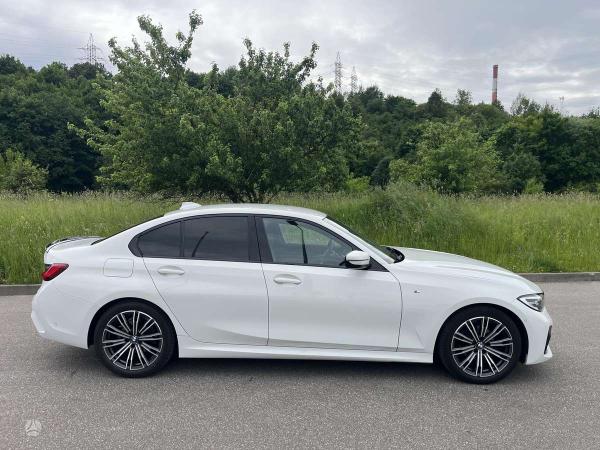 White BMW 318 2020 in Vilnius, with an engine capacity of 2.00 L and mileage of 185 thousand km for 21450 €, photo 4 on AUTOMOTO.COM.LV