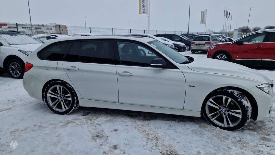 White BMW 318 2013 in Marijampole, with an engine capacity of 2.00 L and mileage of 302 thousand km for 7990 €, photo 6 on AUTOMOTO.COM.LV