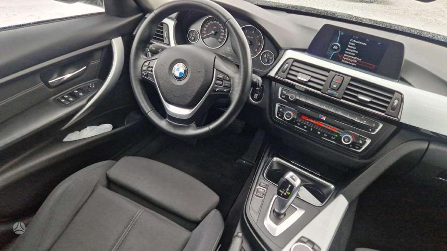 White BMW 318 2013 in Marijampole, with an engine capacity of 2.00 L and mileage of 302 thousand km for 7990 €, photo 14 on AUTOMOTO.COM.LV