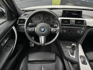 White BMW 318 2013 in Jelgava, with an engine capacity of 2.00 L and mileage of 240 thousand km for 11700 €, photo 6 on AUTOMOTO.COM.LV