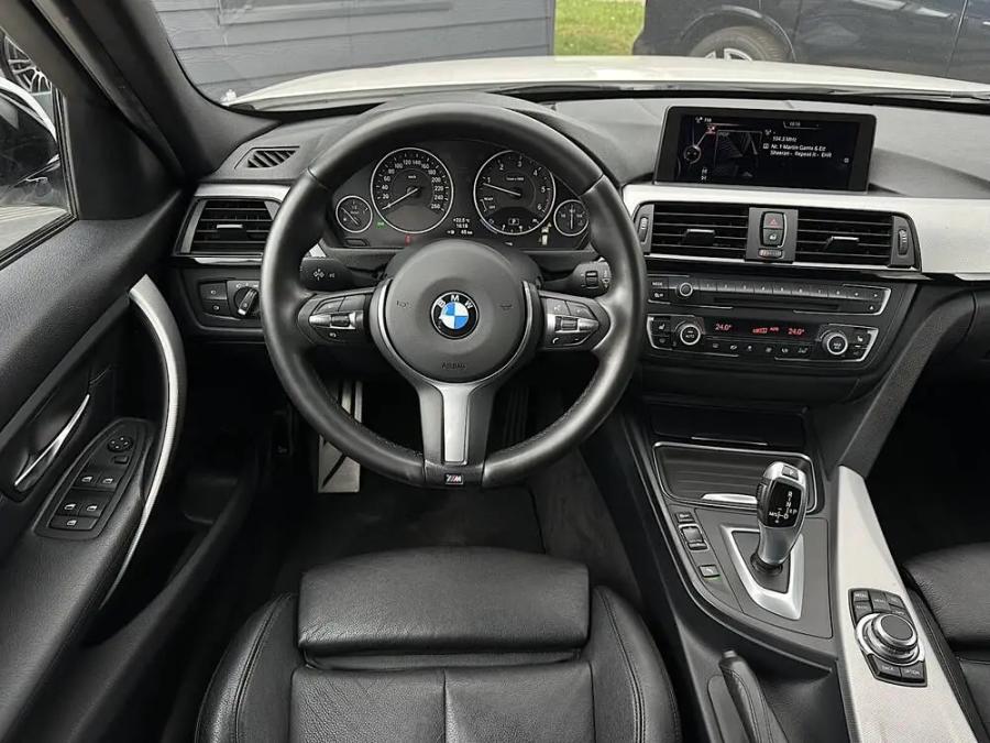 White BMW 318 2013 in Jelgava, with an engine capacity of 2.00 L and mileage of 240 thousand km for 11700 €, photo 6 on AUTOMOTO.COM.LV