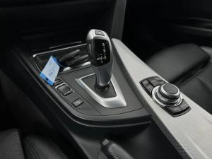 White BMW 318 2013 in Jelgava, with an engine capacity of 2.00 L and mileage of 240 thousand km for 11700 €, photo 18 on AUTOMOTO.COM.LV