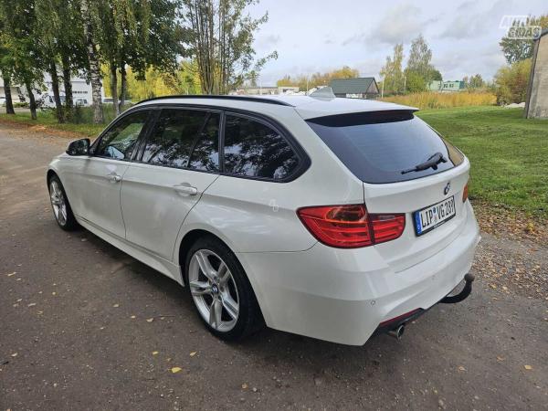 White BMW 318 2013 in Sakiai, with an engine capacity of 2.00 L and mileage of 300 thousand km for 6999 €, photo 8 on AUTOMOTO.COM.LV