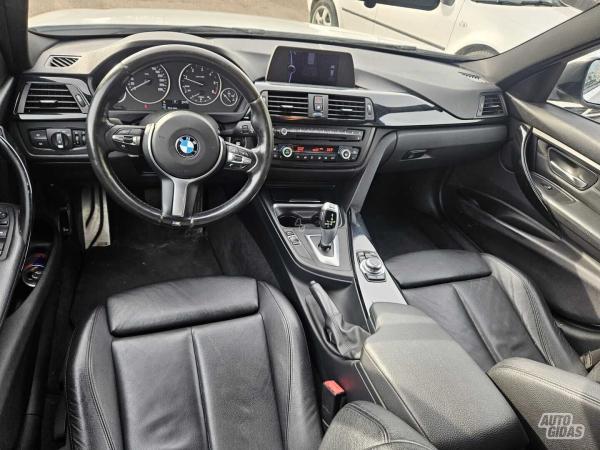 White BMW 318 2013 in Sakiai, with an engine capacity of 2.00 L and mileage of 300 thousand km for 6999 €, photo 10 on AUTOMOTO.COM.LV