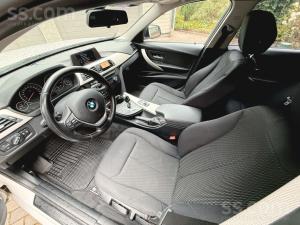 White BMW 318 2014 in Riga, with an engine capacity of 2.00 L and mileage of 263 thousand km for 10600 €, photo 14 on AUTOMOTO.COM.LV