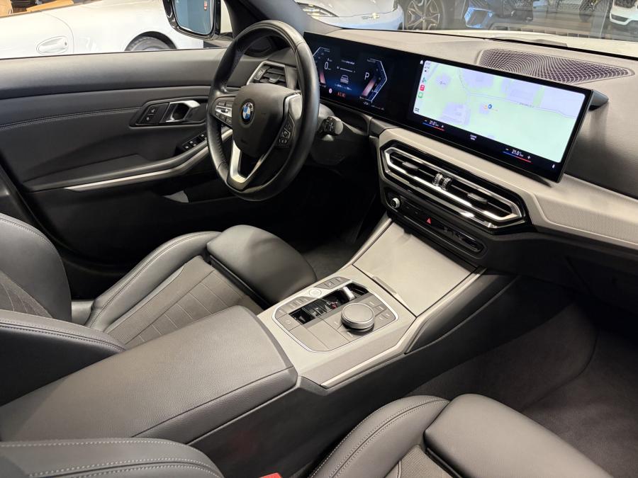 White BMW 318 2023 in Riga, with an engine capacity of 2.00 L and mileage of 70 thousand km for 27990 €, photo 24 on AUTOMOTO.COM.LV