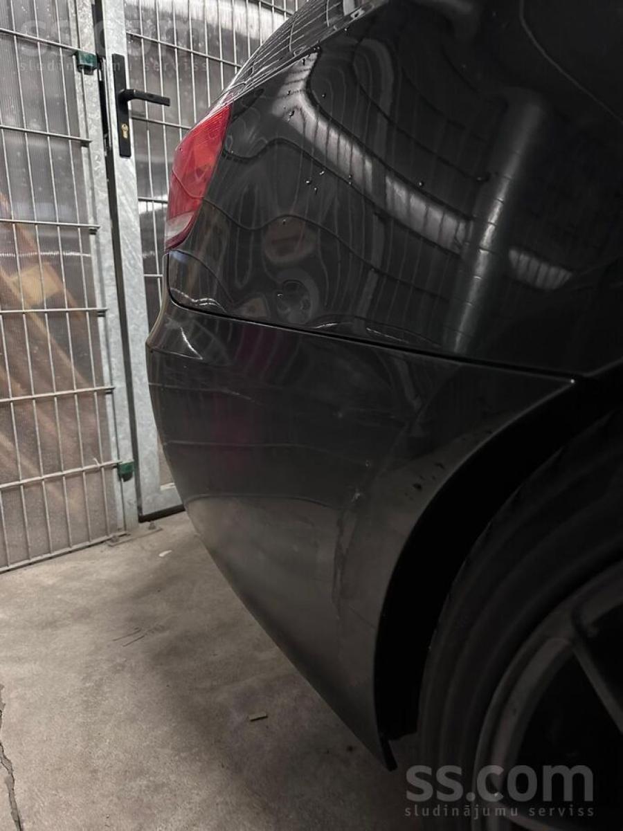 Black BMW 320 2008 in Riga, with an engine capacity of 2.00 L and mileage of 157 thousand km for 2990 €, photo 9 on AUTOMOTO.COM.LV