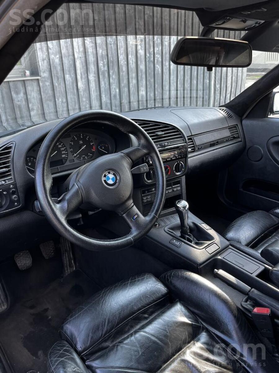 Black BMW 320 1994 in Jekabpils, with an engine capacity of 2.00 L and mileage of 268 thousand km for 6750 €, photo 13 on AUTOMOTO.COM.LV