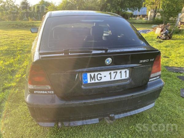 Black BMW 320 2003 in Riga, with an engine capacity of 2.00 L and mileage of 445 thousand km for 1699 €, photo 5 on AUTOMOTO.COM.LV