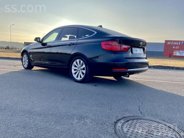 Black BMW 320 2013 in Ogre, with an engine capacity of 2.00 L and mileage of 220 thousand km for 12900 €, photo 4 on AUTOMOTO.COM.LV