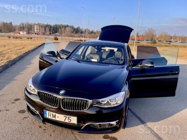 Black BMW 320 2013 in Ogre, with an engine capacity of 2.00 L and mileage of 220 thousand km for 12900 €, photo 5 on AUTOMOTO.COM.LV