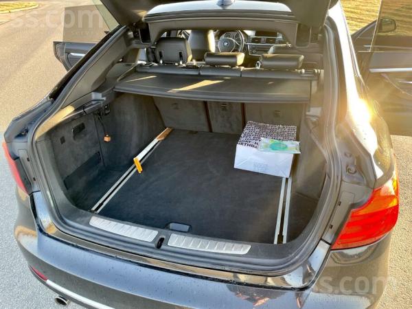 Black BMW 320 2013 in Ogre, with an engine capacity of 2.00 L and mileage of 220 thousand km for 12900 €, photo 6 on AUTOMOTO.COM.LV