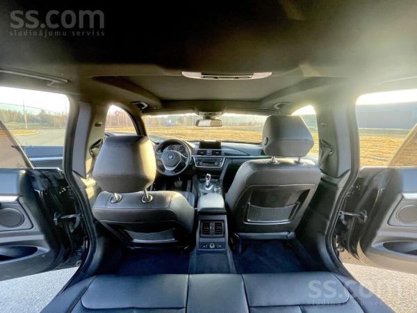 Black BMW 320 2013 in Ogre, with an engine capacity of 2.00 L and mileage of 220 thousand km for 12900 €, photo 8 on AUTOMOTO.COM.LV