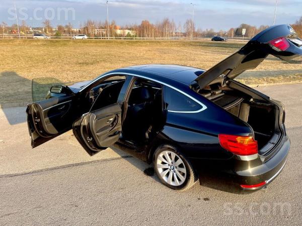 Black BMW 320 2013 in Ogre, with an engine capacity of 2.00 L and mileage of 220 thousand km for 12900 €, photo 10 on AUTOMOTO.COM.LV