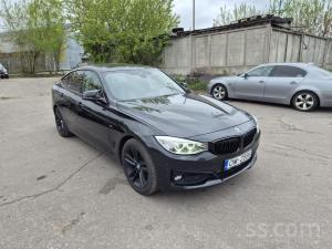 Black BMW 320 2013 in Riga, with an engine capacity of 2.00 L and mileage of 306 thousand km for 9490 €, photo 3 on AUTOMOTO.COM.LV