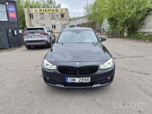 Black BMW 320 2013 in Riga, with an engine capacity of 2.00 L and mileage of 306 thousand km for 9490 €, photo 4 on AUTOMOTO.COM.LV