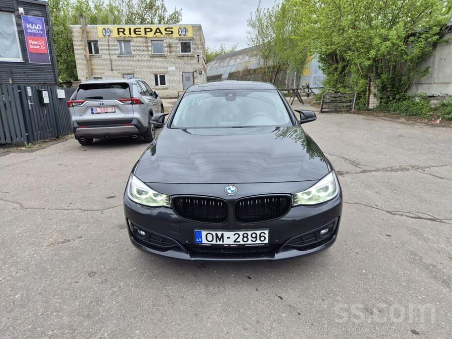 Black BMW 320 2013 in Riga, with an engine capacity of 2.00 L and mileage of 306 thousand km for 9490 €, photo 4 on AUTOMOTO.COM.LV