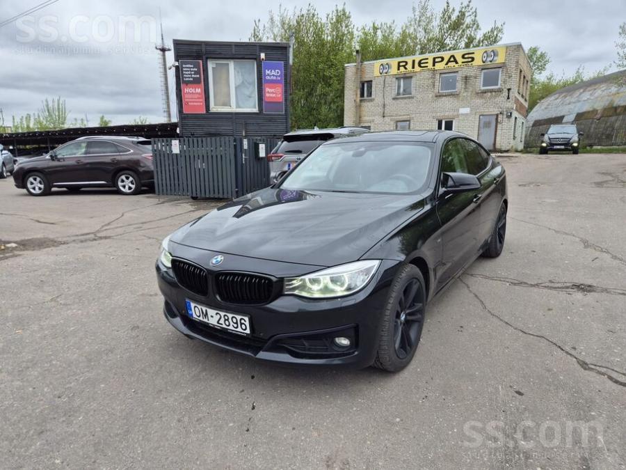 Black BMW 320 2013 in Riga, with an engine capacity of 2.00 L and mileage of 306 thousand km for 9490 €, photo 5 on AUTOMOTO.COM.LV
