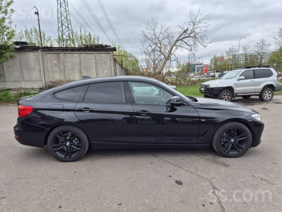 Black BMW 320 2013 in Riga, with an engine capacity of 2.00 L and mileage of 306 thousand km for 9490 €, photo 6 on AUTOMOTO.COM.LV