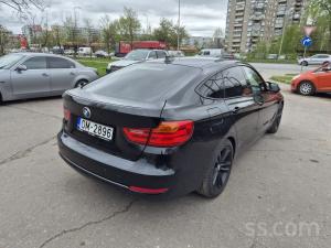 Black BMW 320 2013 in Riga, with an engine capacity of 2.00 L and mileage of 306 thousand km for 9490 €, photo 7 on AUTOMOTO.COM.LV