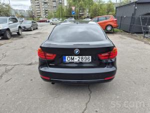 Black BMW 320 2013 in Riga, with an engine capacity of 2.00 L and mileage of 306 thousand km for 9490 €, photo 8 on AUTOMOTO.COM.LV
