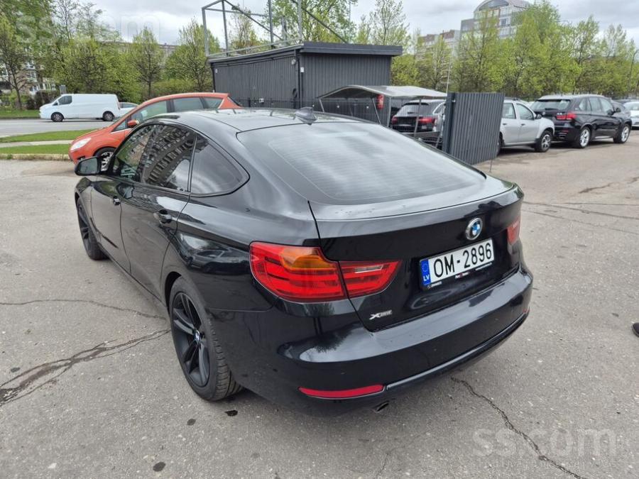 Black BMW 320 2013 in Riga, with an engine capacity of 2.00 L and mileage of 306 thousand km for 9490 €, photo 9 on AUTOMOTO.COM.LV