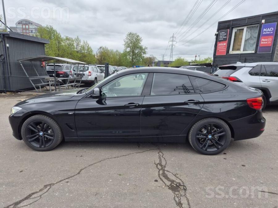 Black BMW 320 2013 in Riga, with an engine capacity of 2.00 L and mileage of 306 thousand km for 9490 €, photo 10 on AUTOMOTO.COM.LV