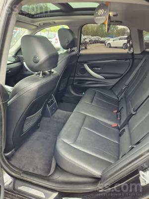 Black BMW 320 2013 in Riga, with an engine capacity of 2.00 L and mileage of 306 thousand km for 9490 €, photo 11 on AUTOMOTO.COM.LV