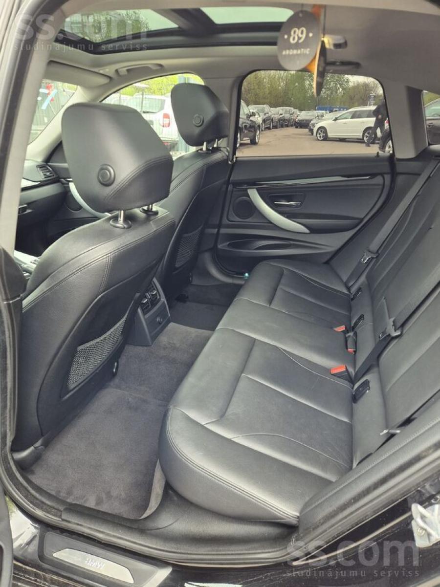 Black BMW 320 2013 in Riga, with an engine capacity of 2.00 L and mileage of 306 thousand km for 9490 €, photo 11 on AUTOMOTO.COM.LV