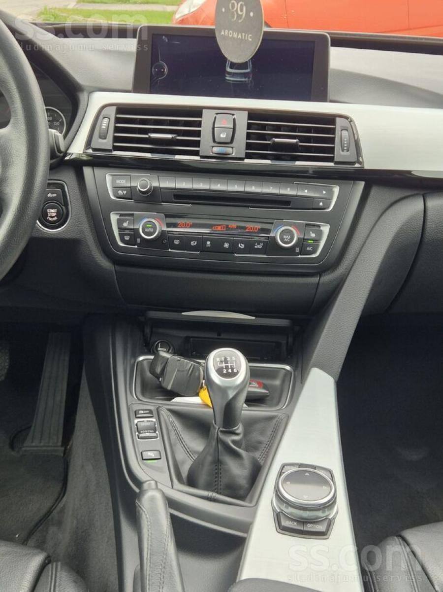 Black BMW 320 2013 in Riga, with an engine capacity of 2.00 L and mileage of 306 thousand km for 9490 €, photo 13 on AUTOMOTO.COM.LV