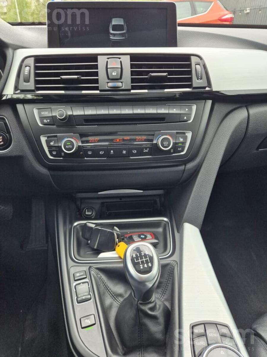 Black BMW 320 2013 in Riga, with an engine capacity of 2.00 L and mileage of 306 thousand km for 9490 €, photo 15 on AUTOMOTO.COM.LV