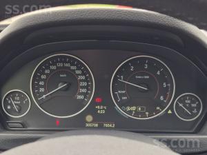Black BMW 320 2013 in Riga, with an engine capacity of 2.00 L and mileage of 306 thousand km for 9490 €, photo 16 on AUTOMOTO.COM.LV