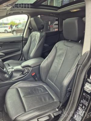 Black BMW 320 2013 in Riga, with an engine capacity of 2.00 L and mileage of 306 thousand km for 9490 €, photo 18 on AUTOMOTO.COM.LV