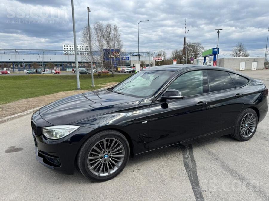 Black BMW 320 2013 in Jelgava, with an engine capacity of 2.00 L and mileage of 305 thousand km for 10800 €, photo 6 on AUTOMOTO.COM.LV