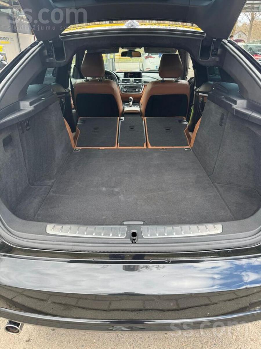 Black BMW 320 2013 in Jelgava, with an engine capacity of 2.00 L and mileage of 305 thousand km for 10800 €, photo 14 on AUTOMOTO.COM.LV
