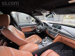 Black BMW 320 2013 in Jelgava, with an engine capacity of 2.00 L and mileage of 305 thousand km for 10800 €, photo 15 on AUTOMOTO.COM.LV