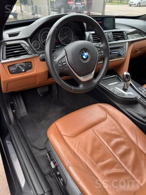 Black BMW 320 2013 in Jelgava, with an engine capacity of 2.00 L and mileage of 305 thousand km for 10800 €, photo 16 on AUTOMOTO.COM.LV
