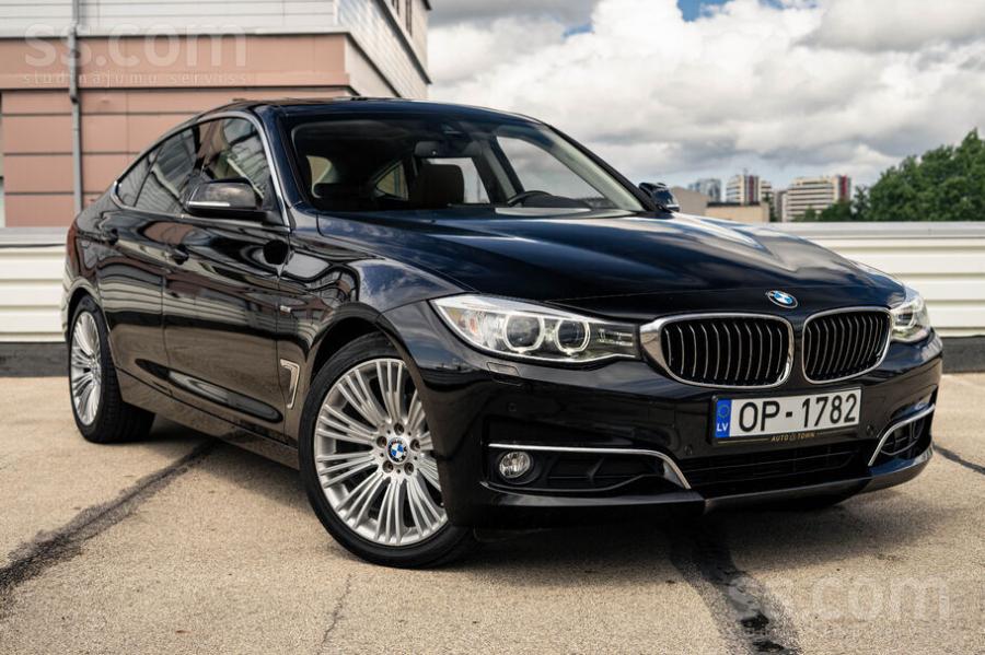 Black BMW 320 2013 in Riga, with an engine capacity of 2.00 L and mileage of 235 thousand km for 11990 €, photo 4 on AUTOMOTO.COM.LV