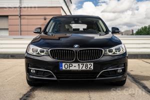 Black BMW 320 2013 in Riga, with an engine capacity of 2.00 L and mileage of 235 thousand km for 11990 €, photo 5 on AUTOMOTO.COM.LV