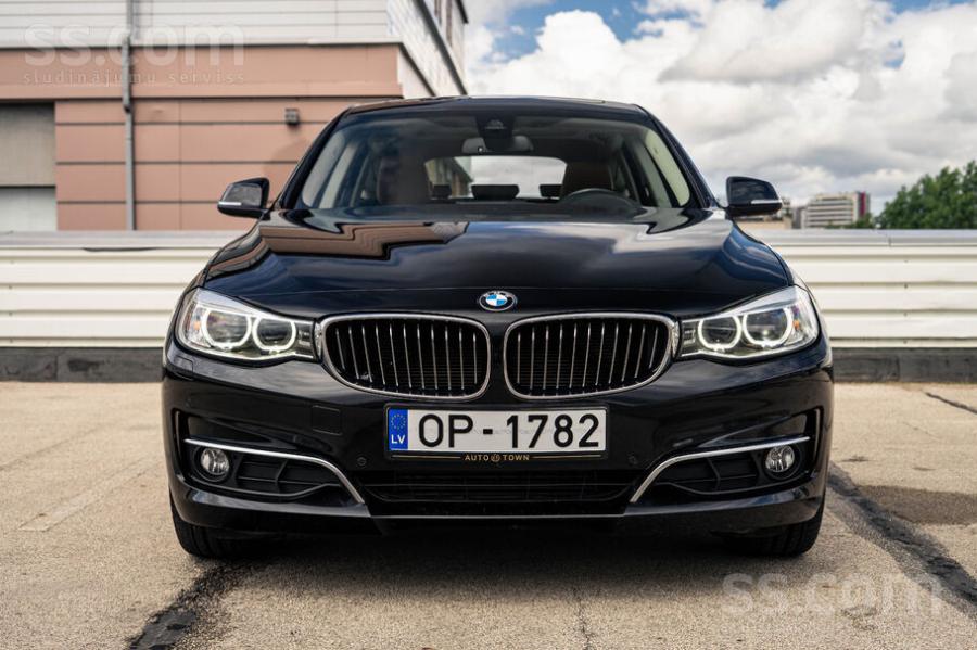 Black BMW 320 2013 in Riga, with an engine capacity of 2.00 L and mileage of 235 thousand km for 11990 €, photo 5 on AUTOMOTO.COM.LV