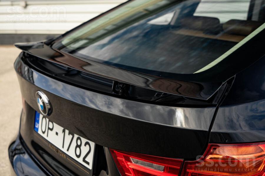 Black BMW 320 2013 in Riga, with an engine capacity of 2.00 L and mileage of 235 thousand km for 11990 €, photo 7 on AUTOMOTO.COM.LV